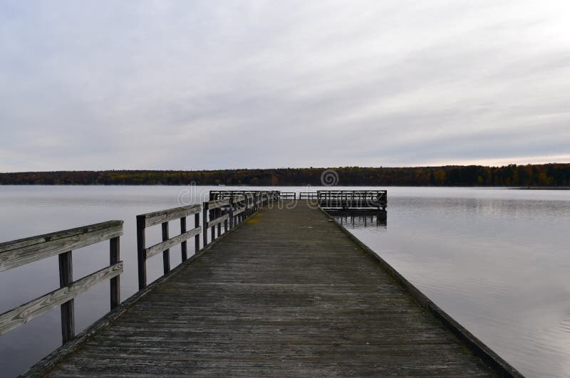 Weathered Dock in a Lake on a Cloudy Fall Day Stock Image - Image of ...