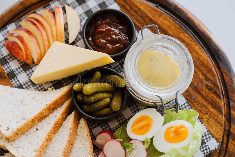 Rustic Platter with Cheese and Condiments Stock Image - Image of ...