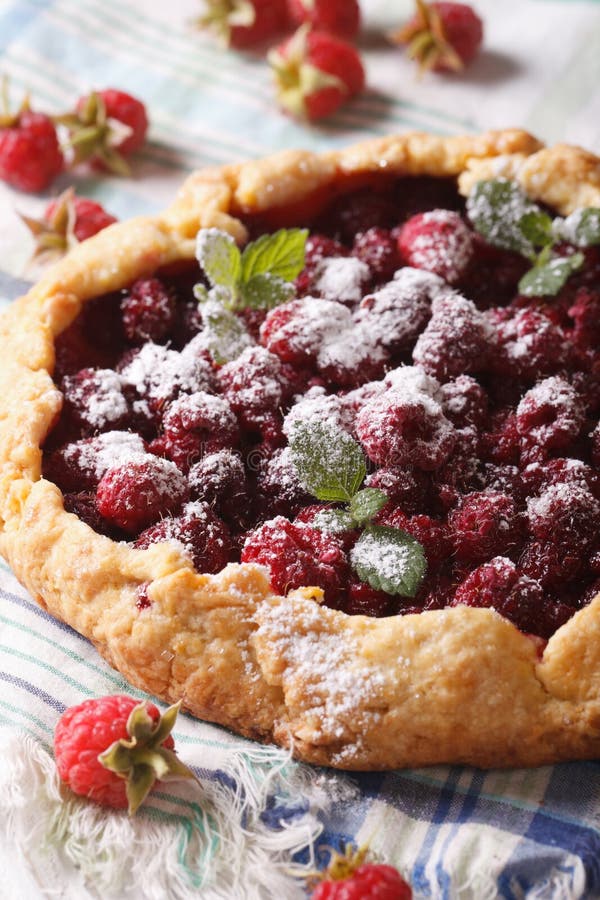 Rustic Raspberry Pie with Mint Close Up on the Table. Vertical Stock ...