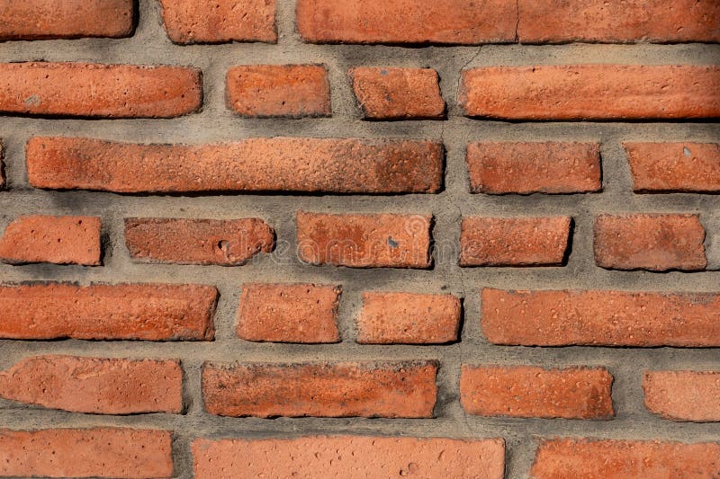 Rustic Red Brick Wall Showcasing Unique Texture and Patterns in Natural ...