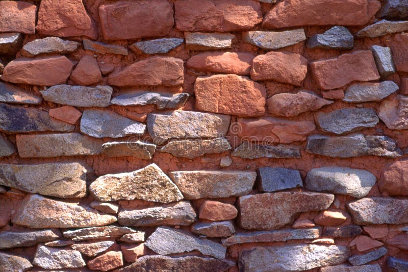 Rustic red stone wall stock photo. Image of rough, background - 54571052