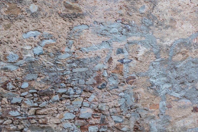 A rustic repaired wall. stock image. Image of destruction - 95436181