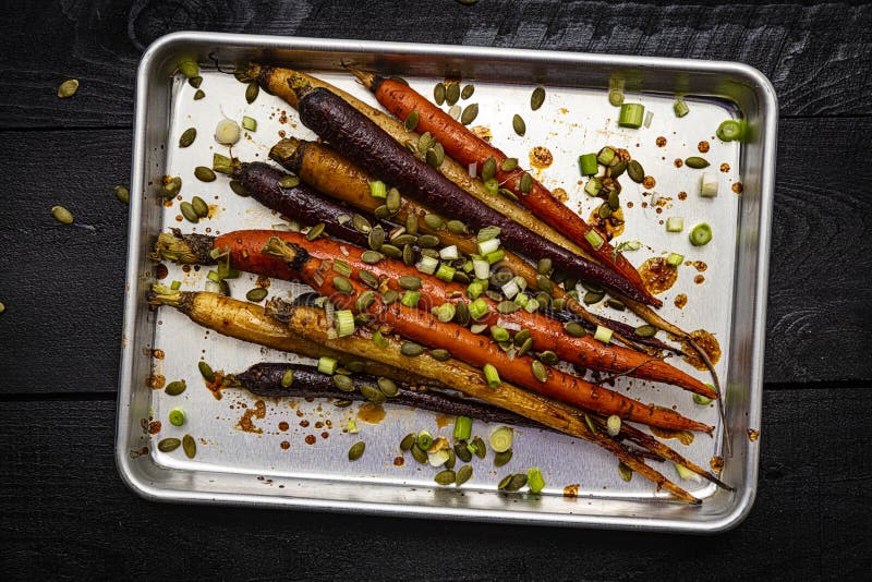 Rustic Roasted Carrots stock image. Image of black, roasted - 257906971