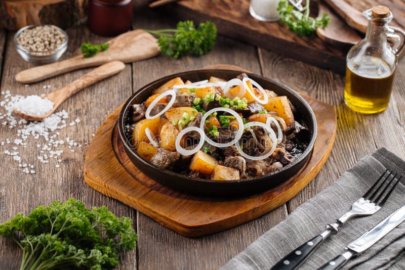 Rustic Roasted Potatoes and Beef in a Pan Stock Photo - Image of ...