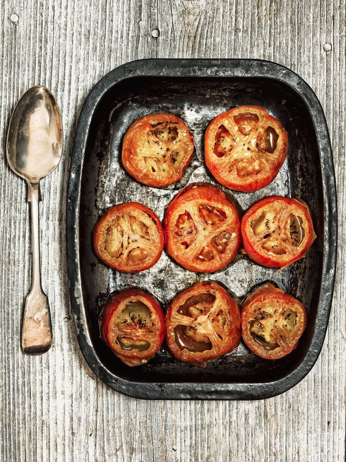 Rustic roasted tomatoes stock photo. Image of vegetarian - 58647512