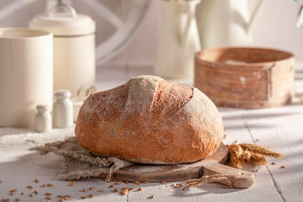 Rustic Round Loaf Bread Baked in a Bright Rustic Kitchen Stock Image ...