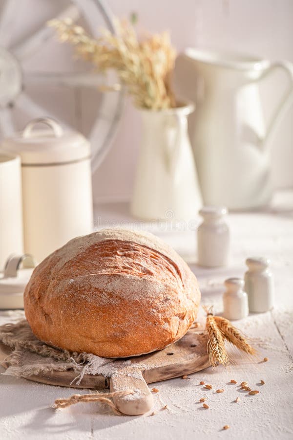 Rustic Round Loaf Bread Baking in with Grain and Ears Stock Image ...