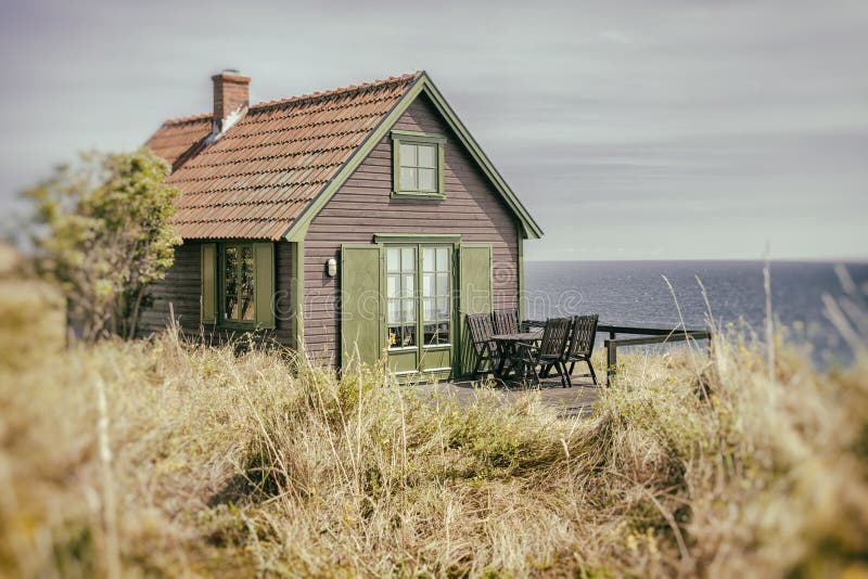 Rustic seaside cottage stock photo. Image of building - 44753484
