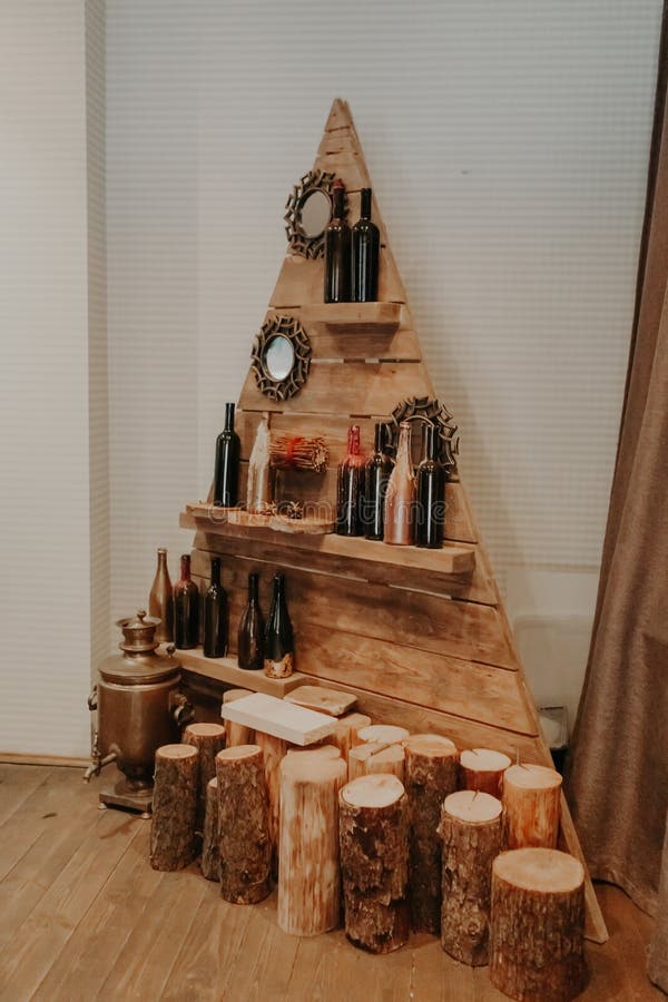 Rustic Shelf Decorated with Bottles, Picks and a Samovar Stock Image ...