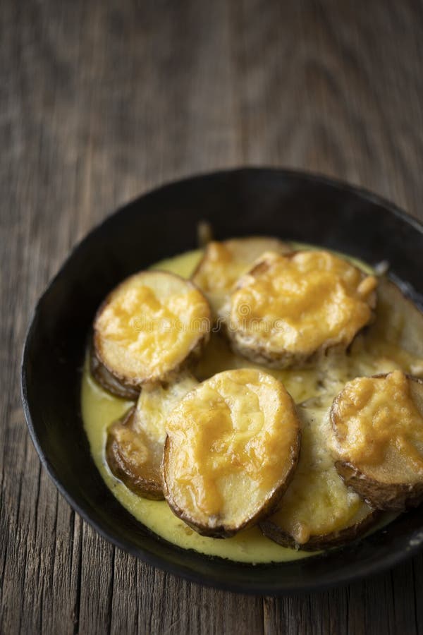 Rustic Spanish Fried Potatoes Patatas Bravas with Cheese Stock Image ...