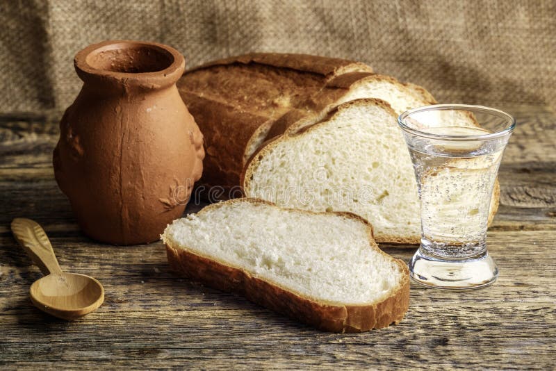 Rustic Still-life Vodka and Bread, the Backdrop of Old Wood Stock Photo ...