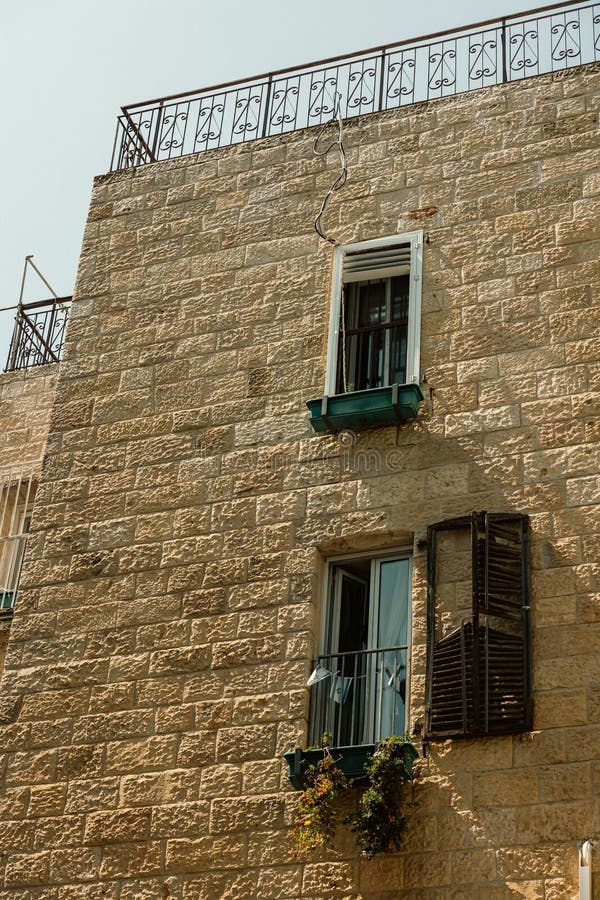 Rustic Stone Building Facade with Open Windows Stock Photo - Image of ...