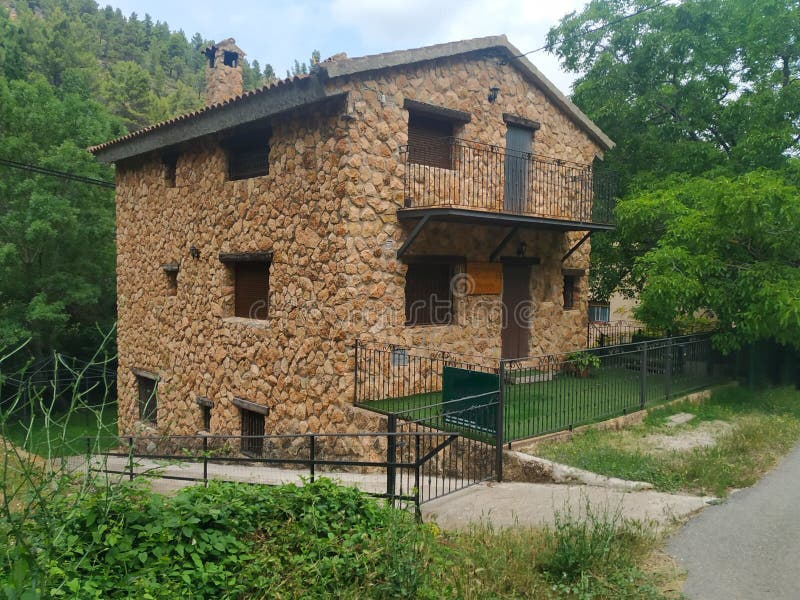 Rustic stone cabin stock photo. Image of cottage, rock - 261387018