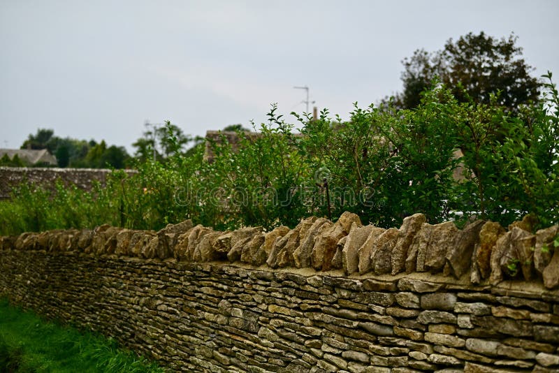 Rustic Stone Wall in the Cotswolds Stock Image - Image of natural ...