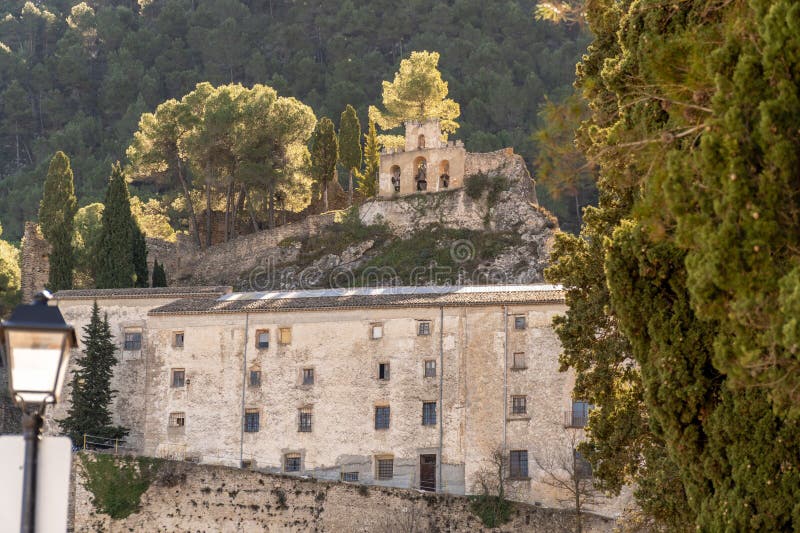 Stone Wall with a Tree Near it and a Castle in the Distance Stock Photo ...