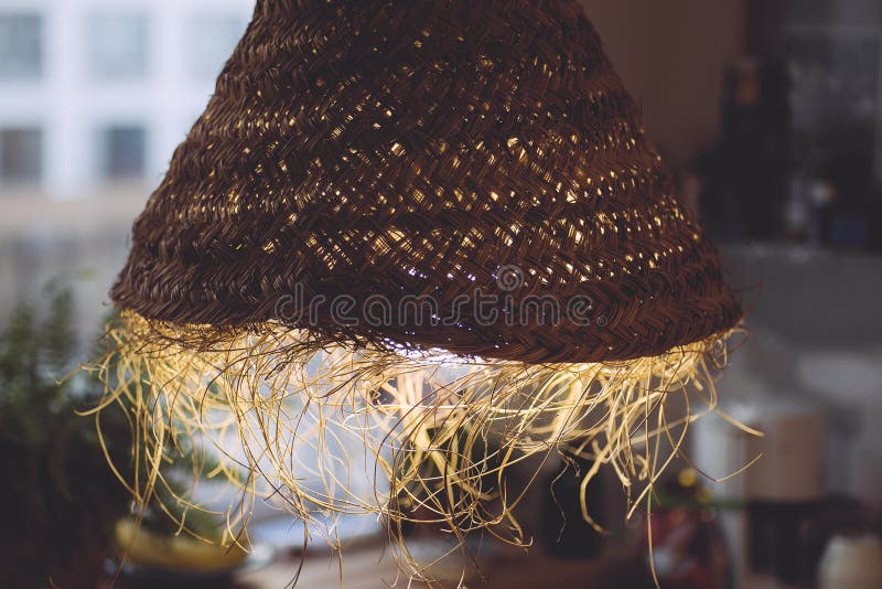 Rustic Straw Lamp Shade with Lamp Over Table. Ideas for Interior ...