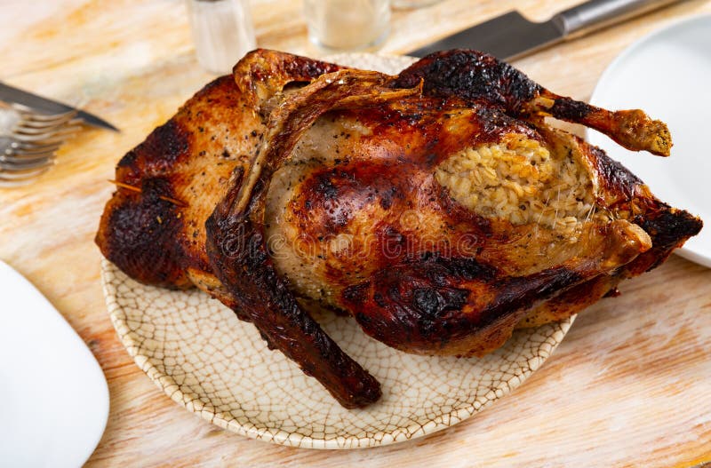 Rustic Style Roasted Goose Stuffed with Barley on Plate Stock Image ...