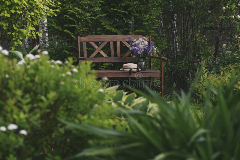 Rustic Summer Cottage Garden View with Wooden Bench. Stock Image ...
