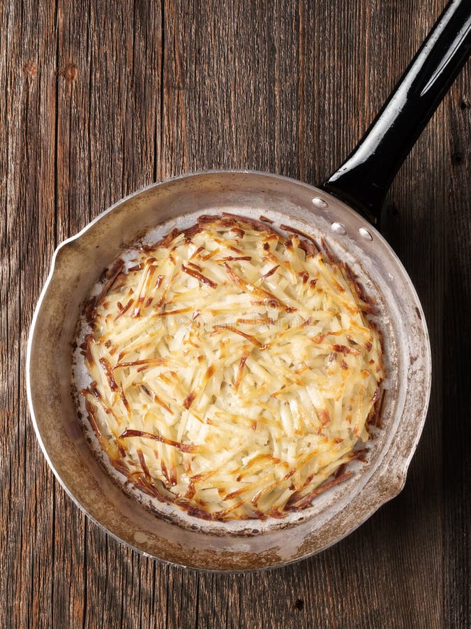 Rustic swiss potato rosti stock photo. Image of rustic - 63677800