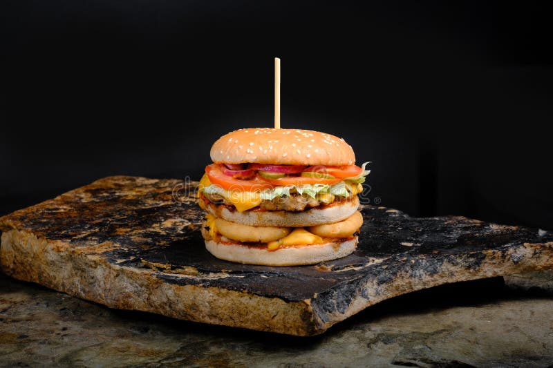 Rustic Tasty Burger on Stone Background Stock Photo - Image of stone ...