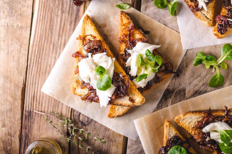 Rustic Toast with Caramelized Onion and Goat Cheese Stock Image - Image ...
