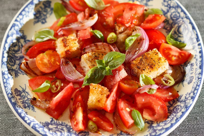 Rustic tomatoes salad stock photo. Image of pile, grilled - 32260960
