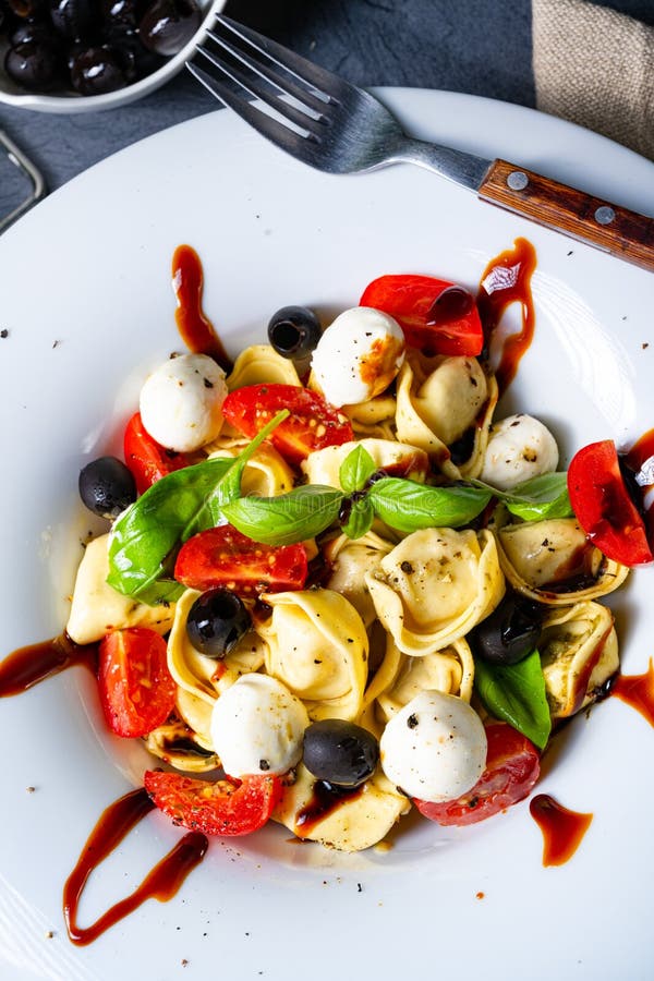 Rustic Tortellini Pasta Salad with Mozzarella Stock Image - Image of ...