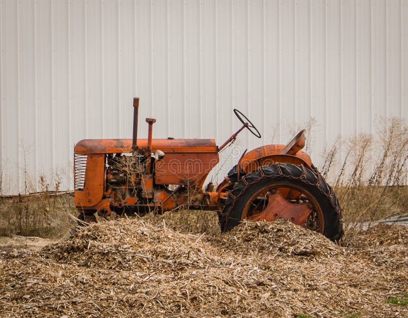 Rustic Old Red Tractor on Ramp of Wooden Barn Stock Image - Image of ...