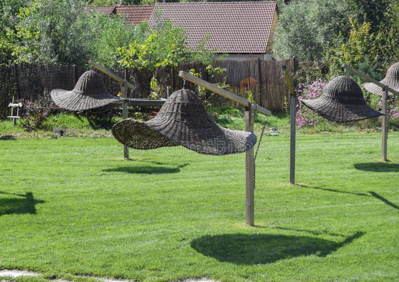 Rustic Umbrella Shaped Hats Woven from Willow Branches at Clay Castle ...