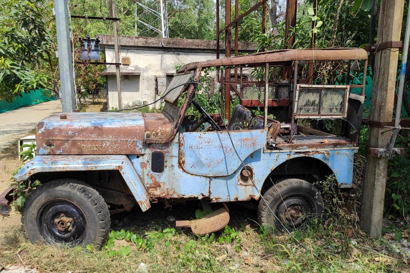 An Old and Rusty Abandoned Vehicle on the Garden Editorial Photo ...