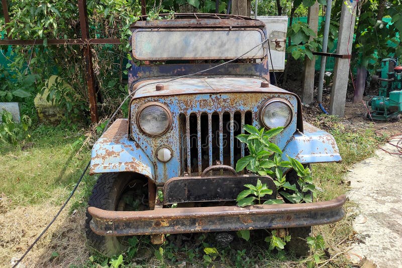 An Old and Rusty Abandoned Vehicle on the Garden Editorial Stock Photo ...