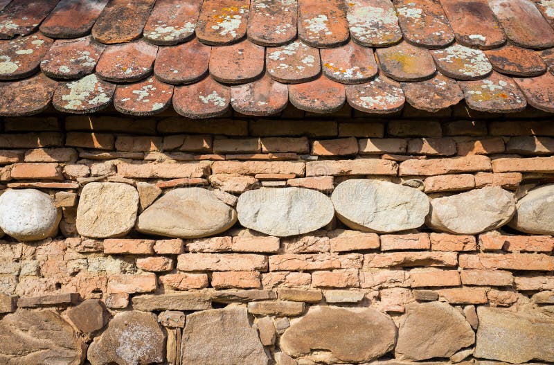 Rustic Wall with Layers of Different Comstruction Materials Stock Image ...