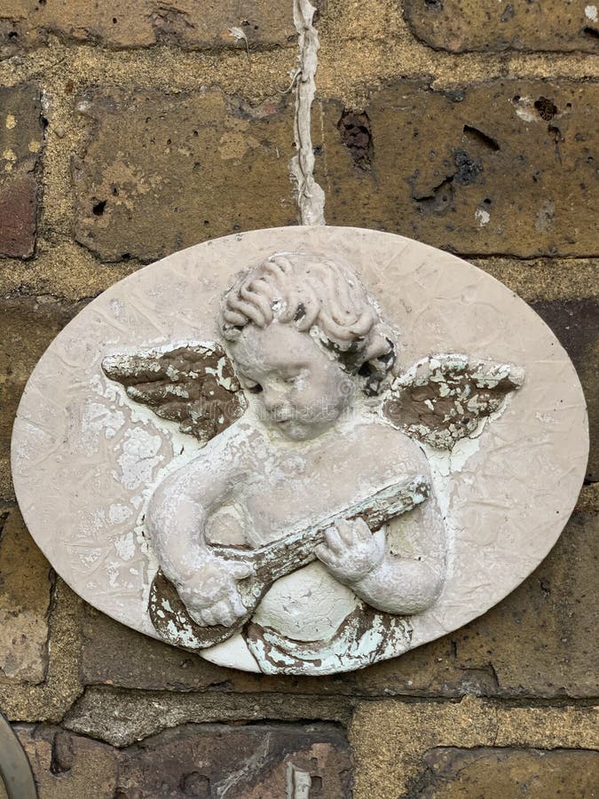 Rustic angel wall plaque stock image. Image of architecture - 259459841