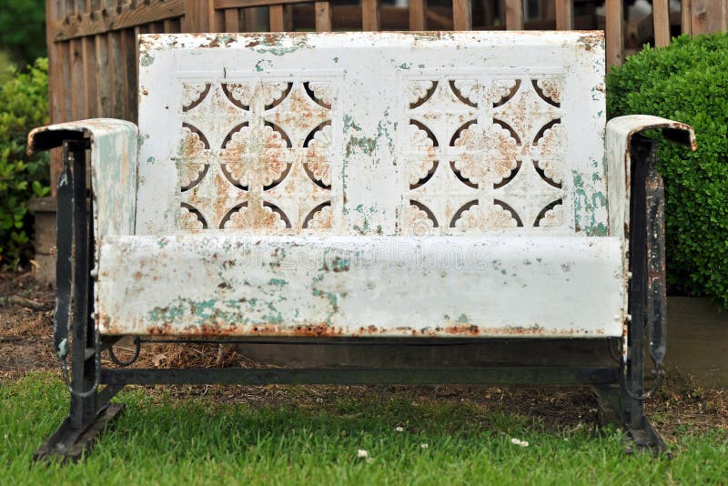 Rustic Weathered Bench in the Grass Stock Photo - Image of paint, rust ...