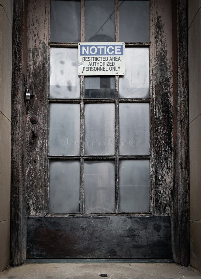 Rustic Weathered Door with Lock and Restricted Access Sign Stock Photo ...