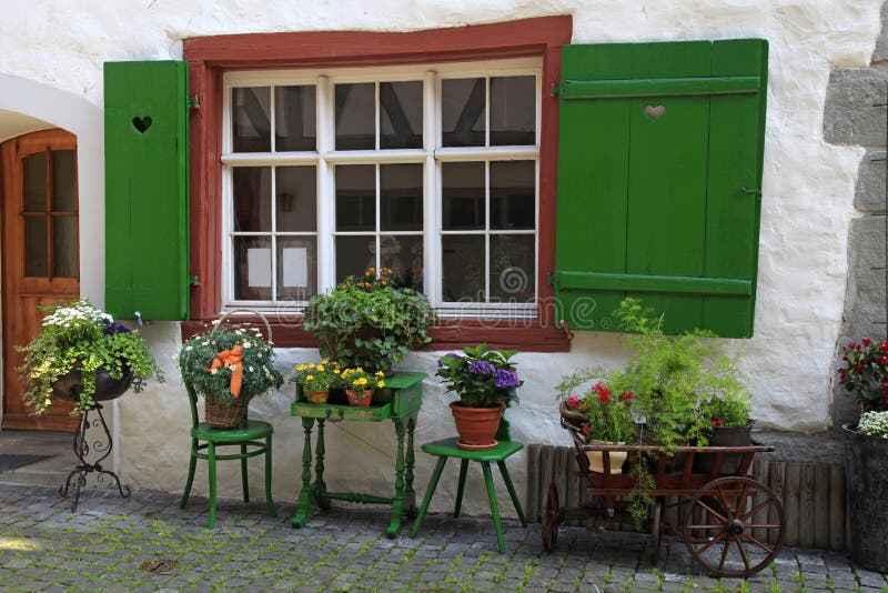 Rustic Window with Green Shutters and Flower Pots Stock Photo - Image ...