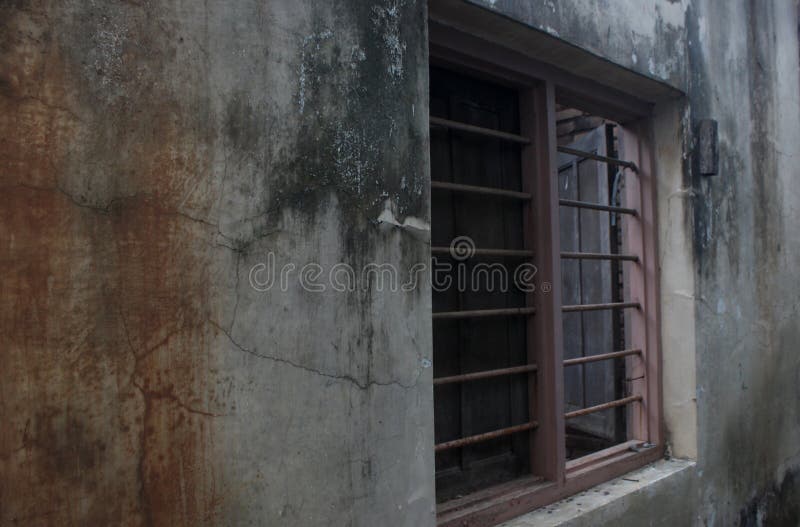 Rustic Window with Iron Bars on Weathered Wall Stock Photo - Image of ...