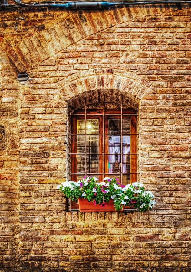 Rustic Window with Metal Grill in a Brick Wall Stock Image - Image of ...