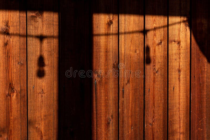Rustic Wood Background with Shadows of Deck Post with String of Lights ...