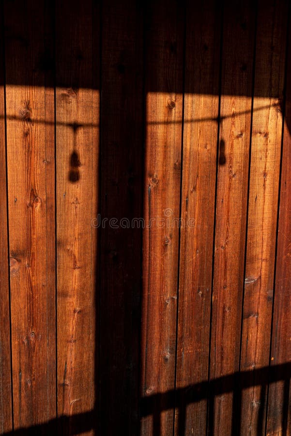 Rustic Wood Background with Shadows of Deck Railing and Post with ...