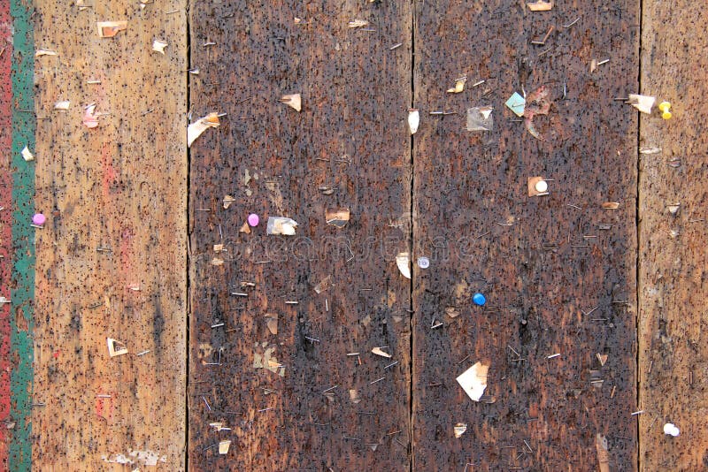 Rustic Wood Panel Background with Torn Pieces of Paper and Staples ...