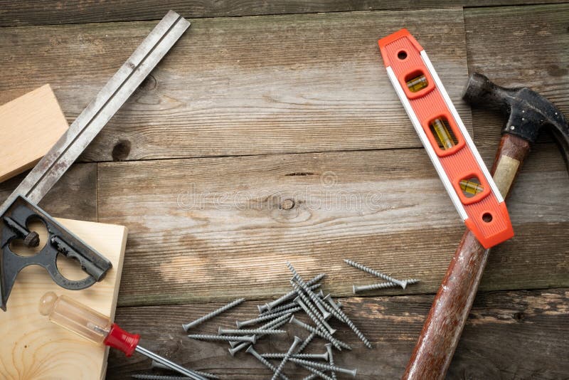 Rustic Wooden Background with Common Tools Around the Edges with Room ...