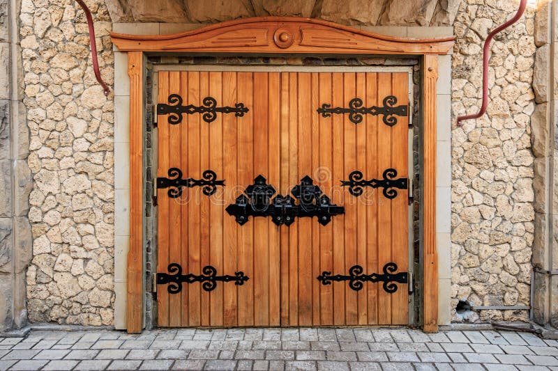 Rustic Wooden Gate Ornate Iron Hinges Stone Wall Stock Photos - Free & Royalty-Free Stock Photos ...