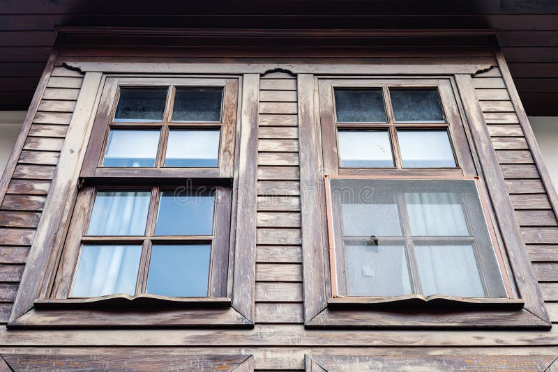 Rustic Wooden House Windows with Weathered Texture and Reflections ...