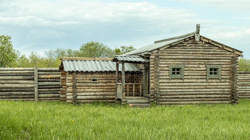 Rustic Wooden Huts Made of Logs Stock Photo - Image of dark, cottage ...