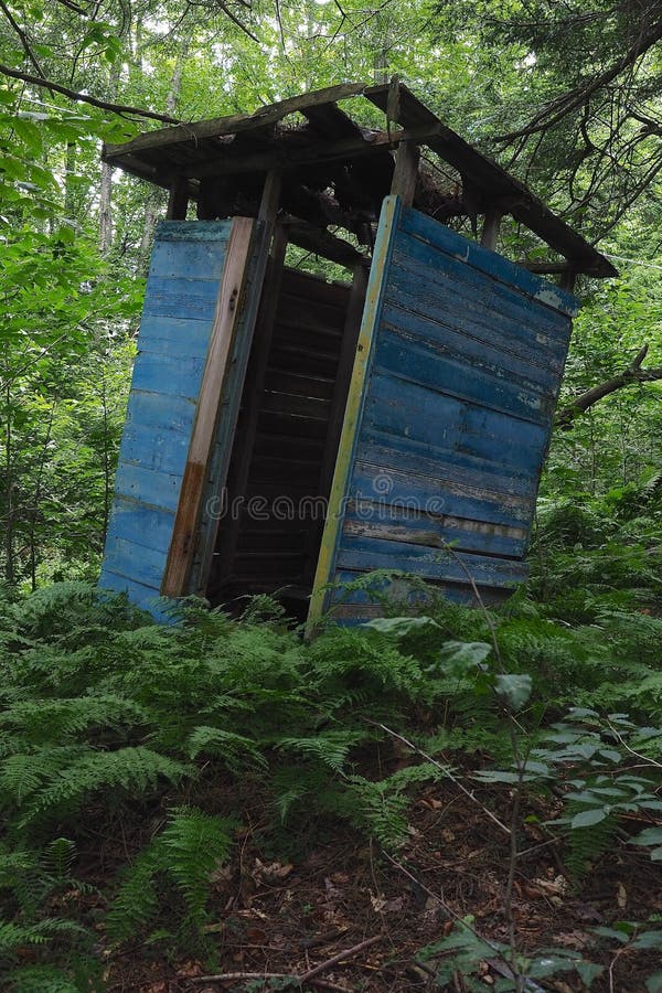 Blue Outhouse on a Hill with an Open Door Stock Photo - Image of ...
