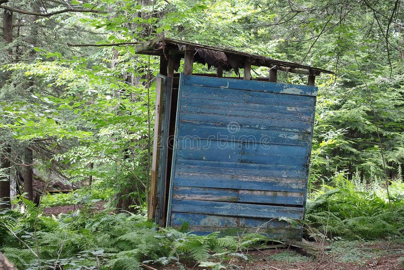 Rustic Wooden Outhouse stock photo. Image of blue, sits - 92839758