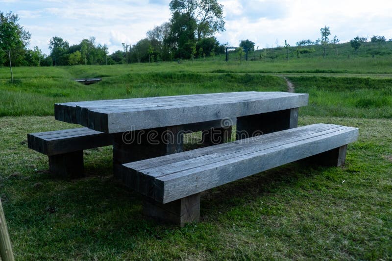 Rustic Wooden Picnic Table in Lush Green Park Landscape Stock Image ...