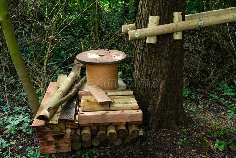 Rustic Wooden Structure Crafted from Logs and Cylinders in a Forest ...