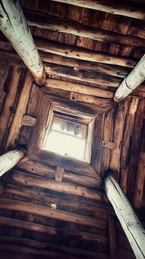 Rustic Wooden Structure Interior with Four Beams and Natural Light ...